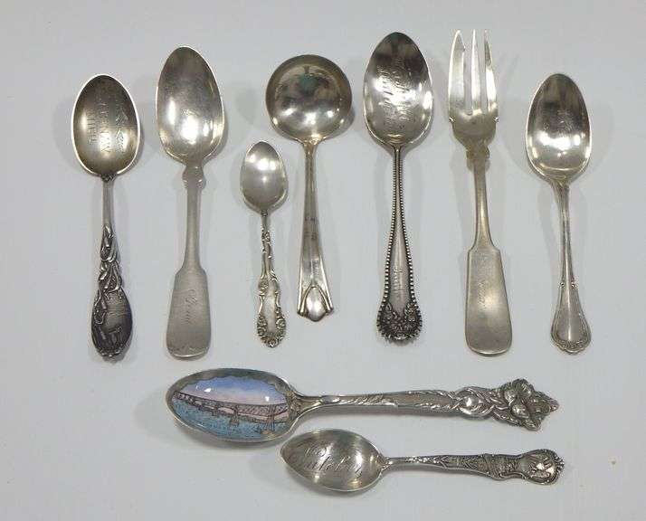 (8) Sterling spoons and a fork, all marked sterling, souvenir spoons ...