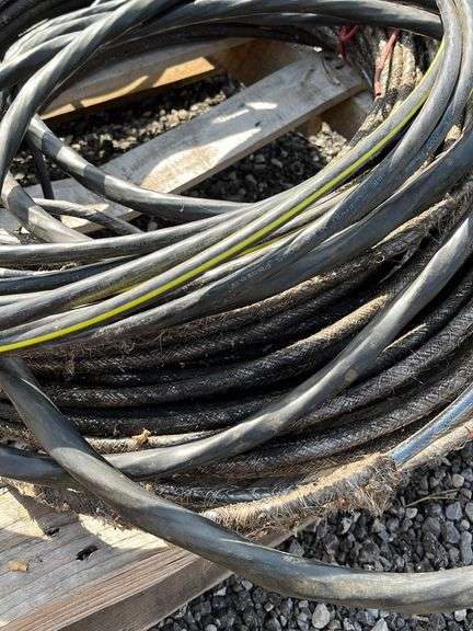 One piece of heavy copper wire, approx. 250' maybe No. 6; One piece of ...