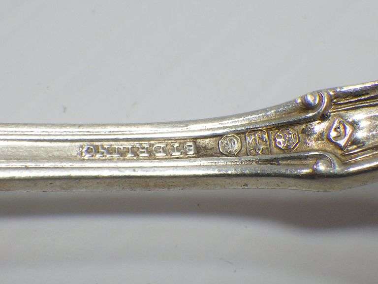 (8) Sterling spoons and a fork, all marked sterling, souvenir spoons ...