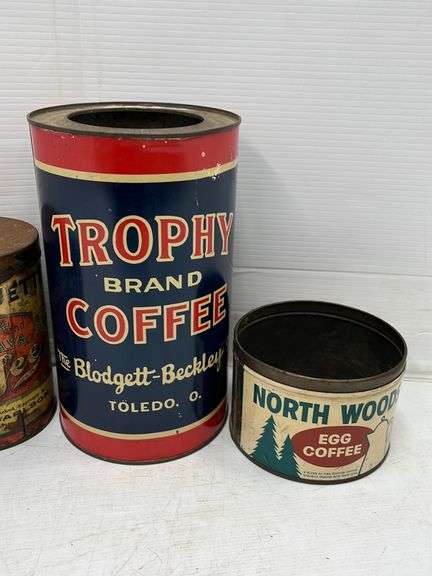 (5) Old tin coffee cans, 4"H to 9 1/2"H - Albrecht Auction Service
