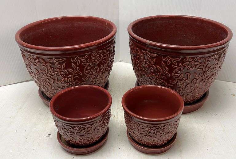 (4) Matching red glass flower pots, small- 6"W x 5"H, large- 12"W x 10 ...