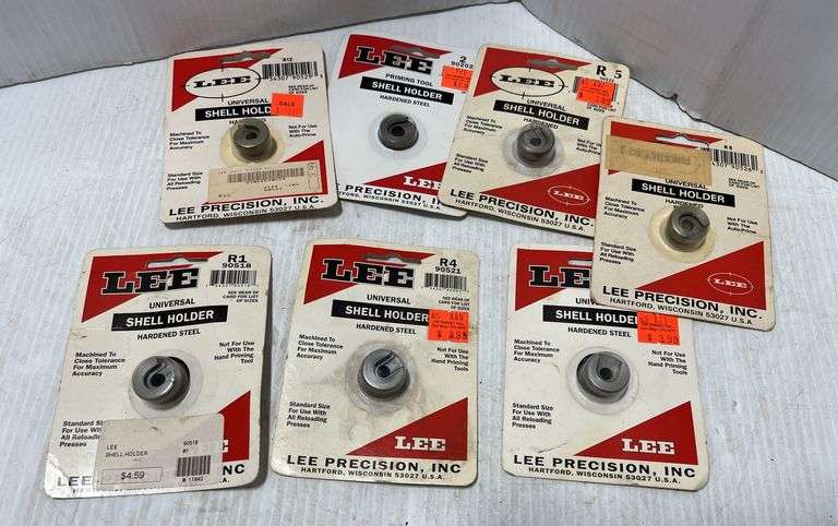(7) Lee Universal shell holders, Nos. 1, 2, 4, 5, 9, 12, and 19, all in ...
