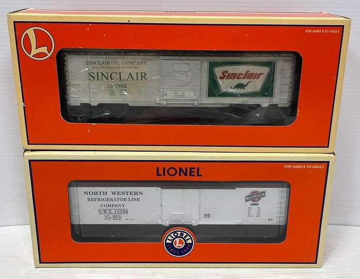 (2) Lionel freight cars, include: Sainclair and Northwestern, both O ...