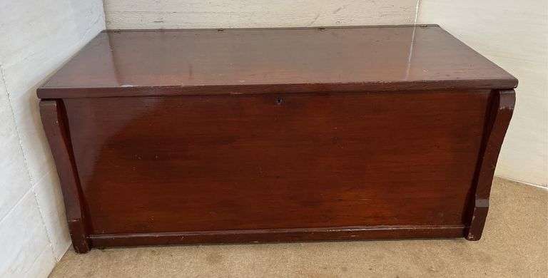 Antique wood chest on casters, 49"W x 22"D x 23"H, solid, has wear ...