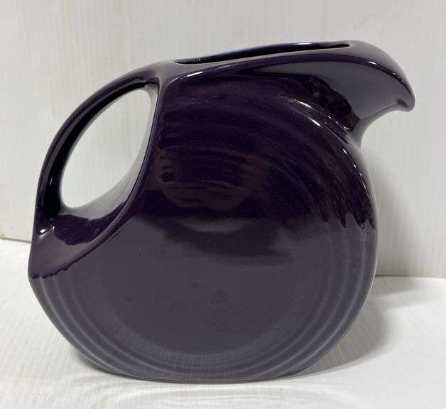 Older Fiesta purple 64oz. pitcher, 7 1/4"H, good - Albrecht Auction Service