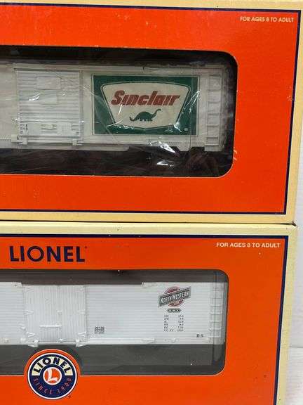 (2) Lionel freight cars, include: Sainclair and Northwestern, both O ...
