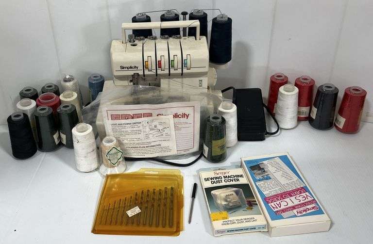 Simplicity serger machine with items, 13"H - Albrecht Auction Service