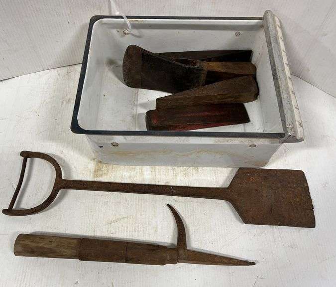 Assorted logging items, include: (4) Splitting wedges, Axe head that ...