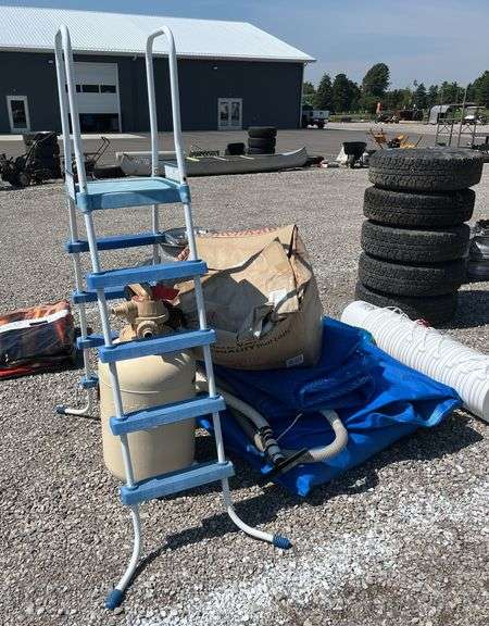 14' Round pool with sand fertilizer, ladder, solar cover, pump, and ...