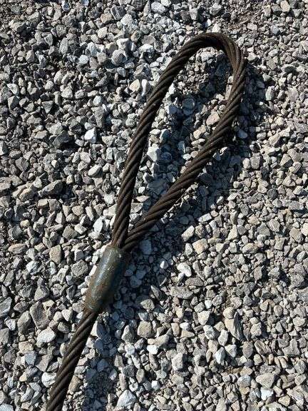 Metal rope cable for lifting sling, 1"Dia, appears looped at both ends ...