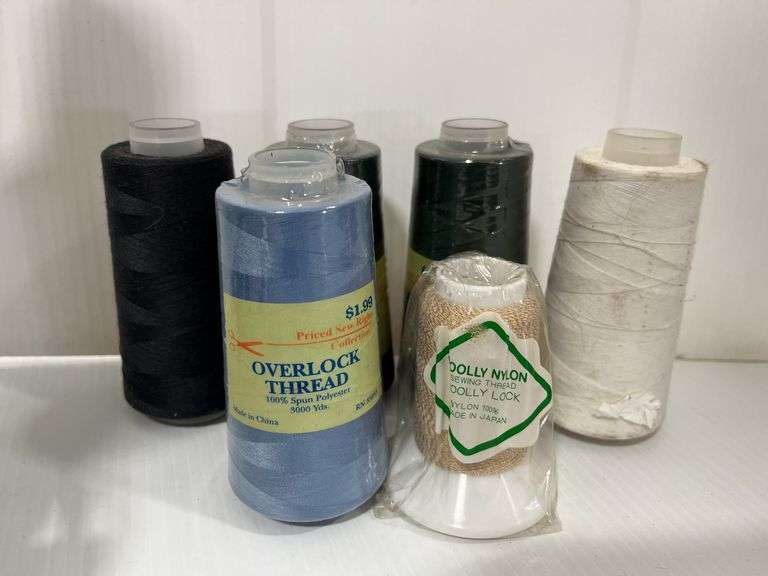 Simplicity serger machine with items, 13"H - Albrecht Auction Service