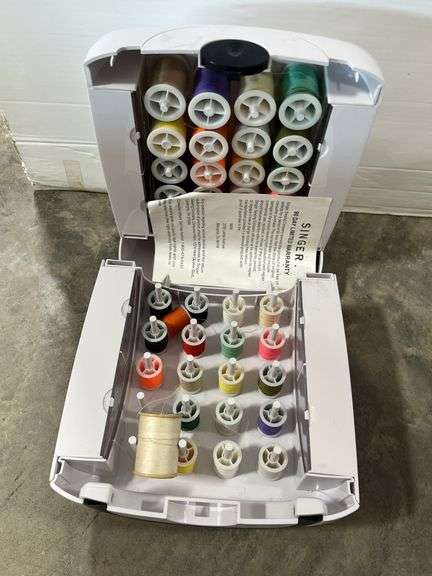 Assorted sewing items, include: Mighty Mender W100, Singer 4530C ...