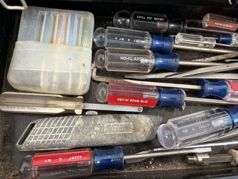 Craftsman three-drawer tool box with top filled with Craftsman ...