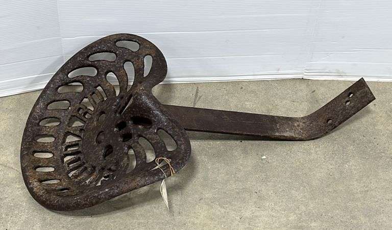 Cast iron Stoddard tractor seat, stamped M85 on back of seat, seat- 18 ...