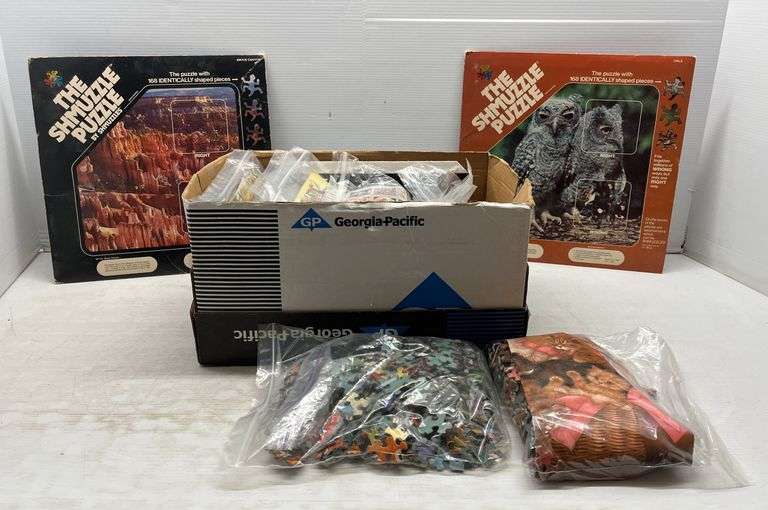 (14) Jigsaw puzzles, two shmuzzle puzzles, puzzles are in a gallon ...