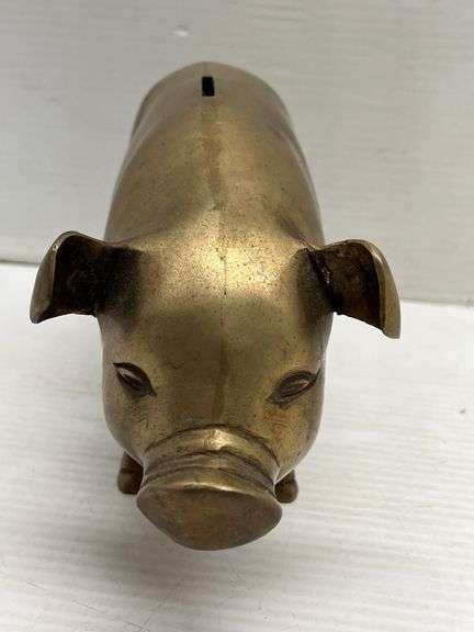 Brass still pig shaped piggy bank, and small ceramic bulldog piggy bank, up to 10 1/2"L, very ...