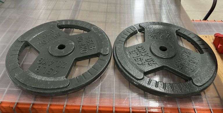 (2) 45 lb. Weight plates, with EZ grip handles for safe secure handling ...