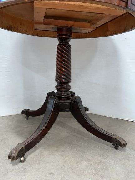 Round leather-top table with one drawer, 30 1/2"Dia x 29"H, claw feet ...
