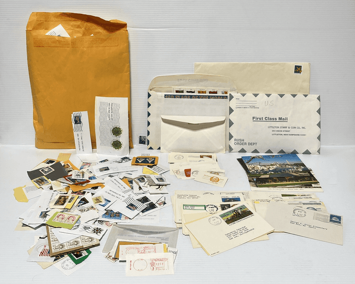 Assorted stamps, include: some still on paper, some new/not postmarked ...