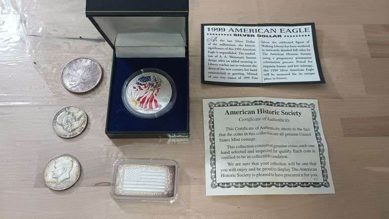 (5) Silver coins, include: 1999 American Eagle silver dollar, marked ...