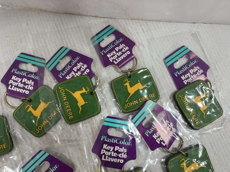 (12) John Deere key chains, new - Albrecht Auction Service