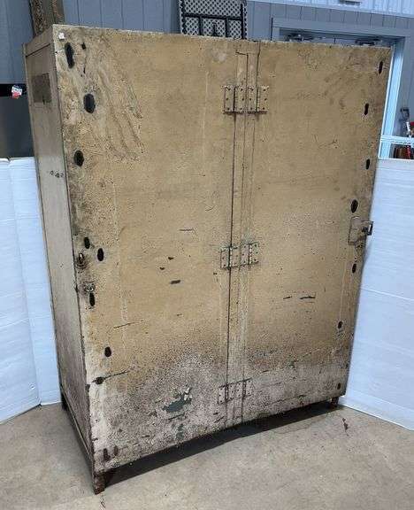 Large tan metal 2-door locker/cabinet, has spots for padlocks and air ...