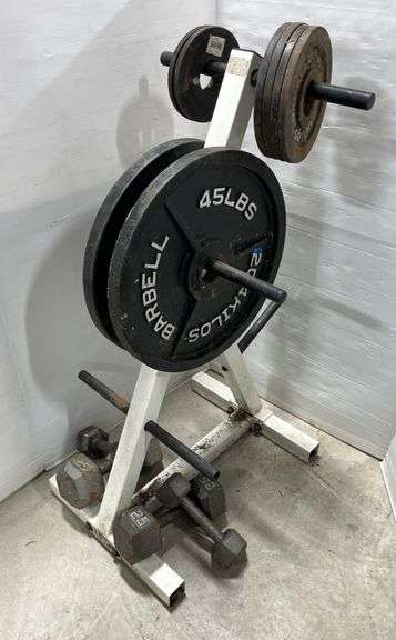 Older weights, includes: Two- 45 lbs plates.; Four- 5 lbs. plates; Two ...