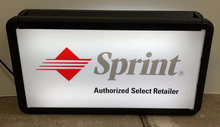 Sprint sign, lights up, 26 1/2"W x 14 1/2"H - Albrecht Auction Service