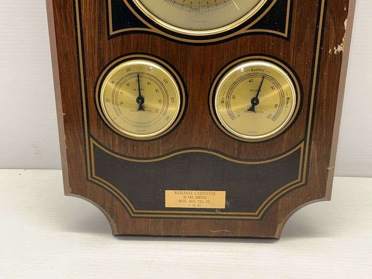 Bulova clock with barometer, temperature, and humidity, 28"H, scratches ...
