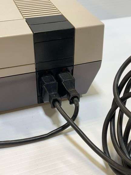 1985 Nintendo, comes with (2) paddles, Model No. NES 001, 1st ...