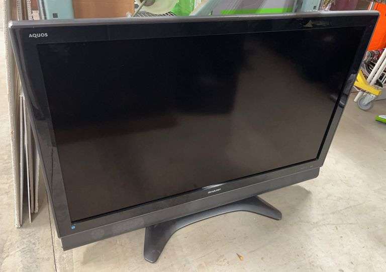 Sharp Aquos 52" flat screen LCD TV with remote, has 2-HDMI ports/inputs ...