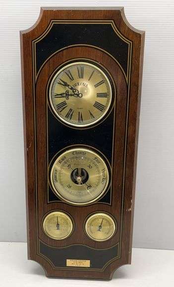 Bulova clock with barometer, temperature, and humidity, 28"H, scratches ...
