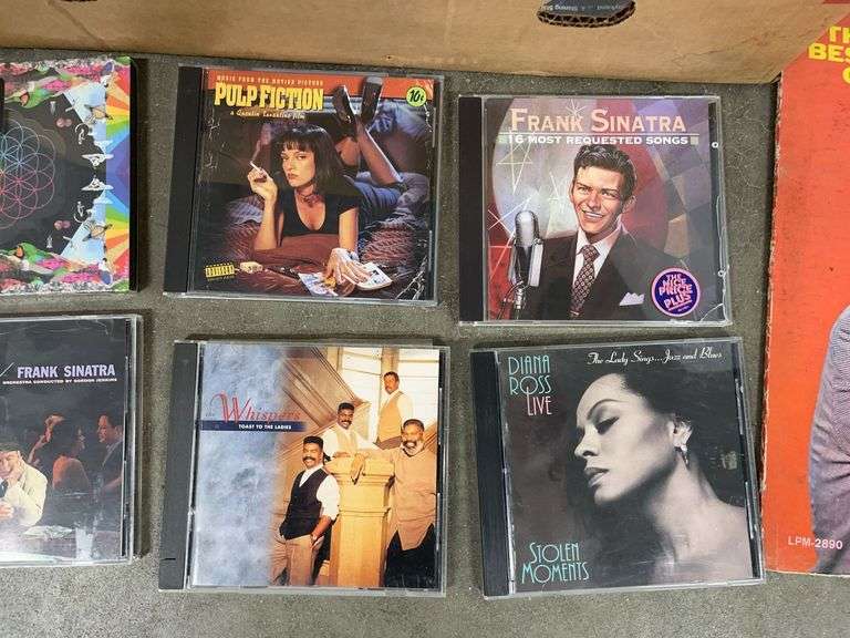 Assorted CDs and 45 RPM vinyl records - Albrecht Auction Service