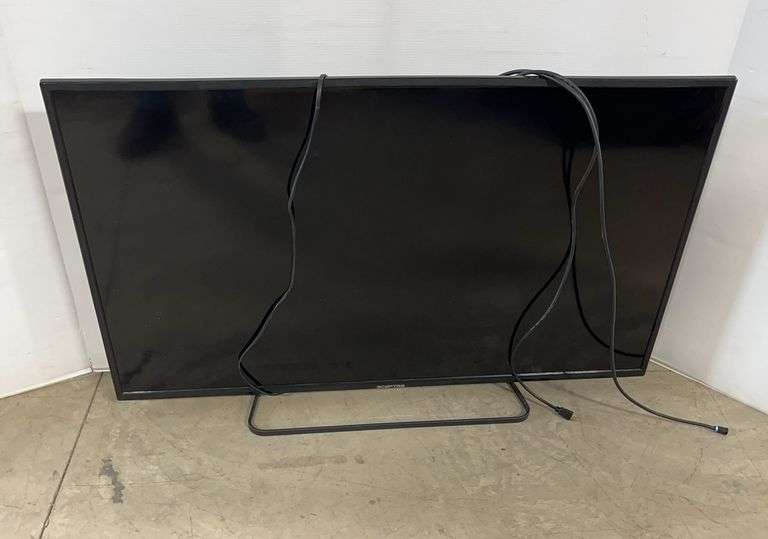Spectre 50" TV with stand, good, no remote included - Albrecht Auction ...