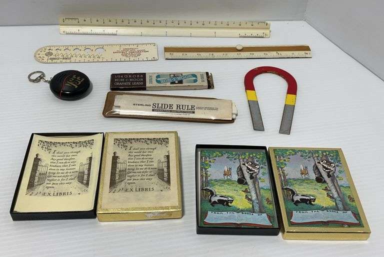 Small advertising items, includes: Slide ruler, circle scale, lead ...