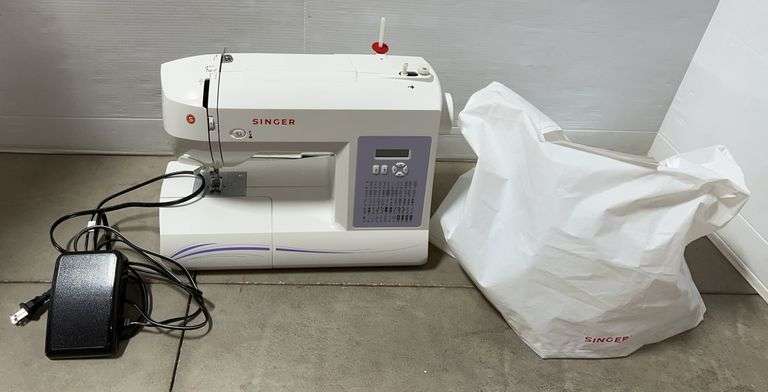 Singer electronic sewing machine, Model No. 6160, comes with a dust ...