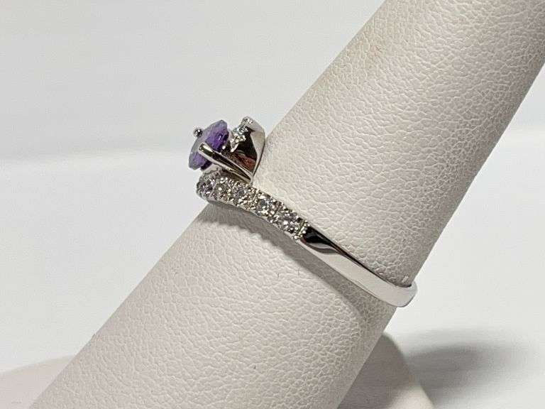 Amethyst cubic zirconia and clear cubic zirconia ring, size 8, marked ...