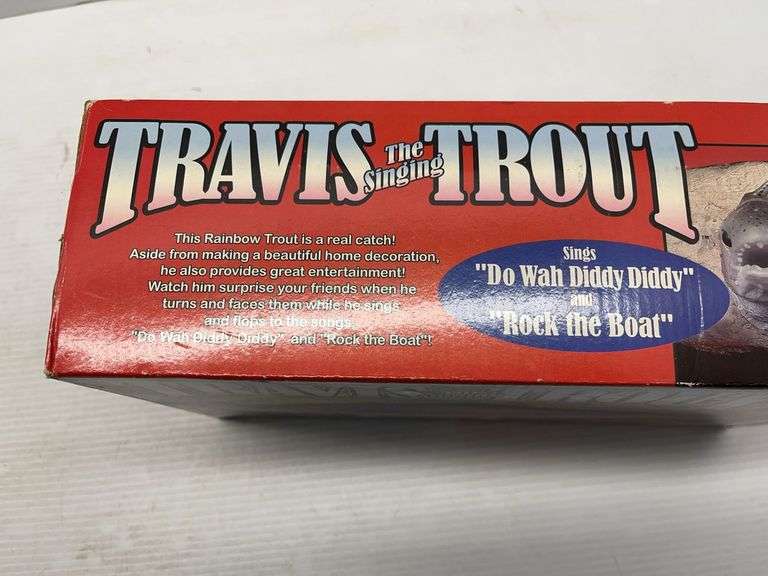 Motion activated "Travis the Singing Trout", sings "Rock the Boat" and ...