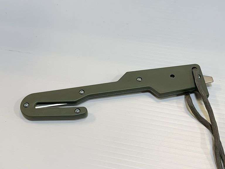 Gerber safety tool with seatbelt cutter and window punch; Gerber combat ...