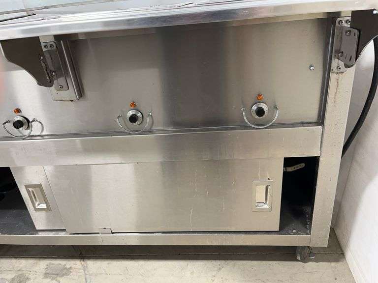 Duke hot food table with 4 wells and sneeze guard, under shelf ...