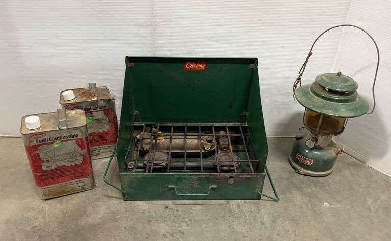 (2) Gallons of Coleman camp fuel, includes: 1- Gas camp stove, and 1 ...