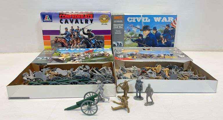 (4) Boxes of various older toy soldiers, includes cannons and horses ...