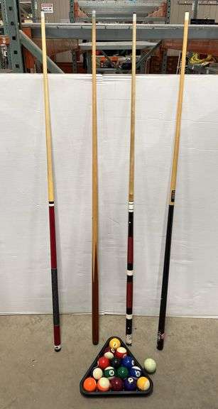 (4) Pool sticks, rack, and pool balls - Albrecht Auction Service