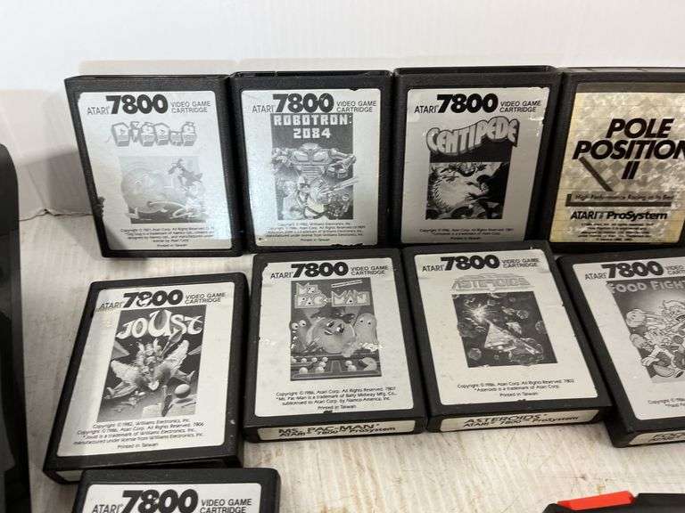 Atari 7800 Pro-System, comes with (3) controllers, and (11) games ...