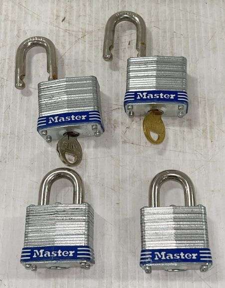 (4) Master Locks with all the same key, new - Albrecht Auction Service