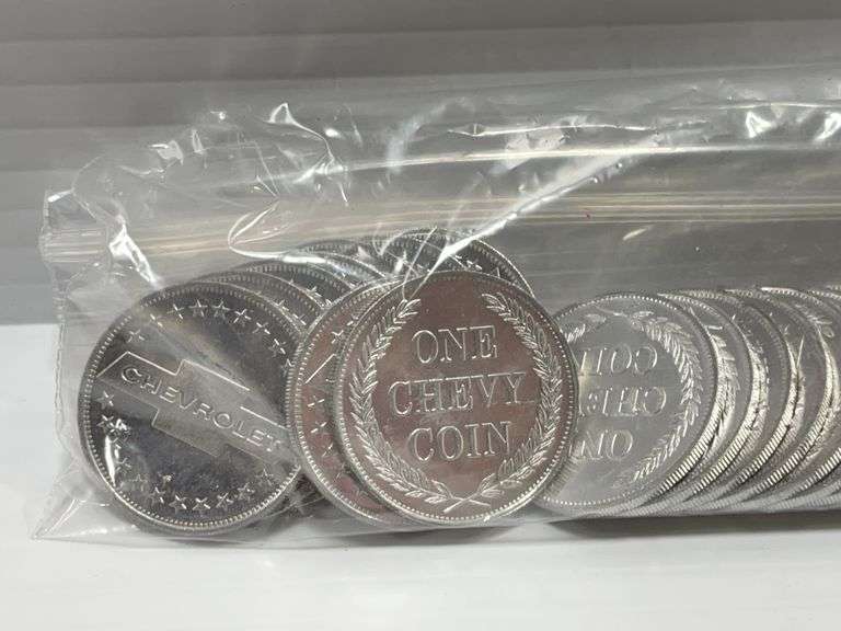 (41) Coins, includes: 35- Aluminium Chevrolet Coins, one Chevy coin; 6 ...