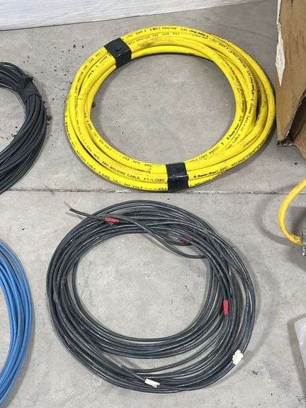 Assorted copper wiring of different lengths and thicknesses, some on ...