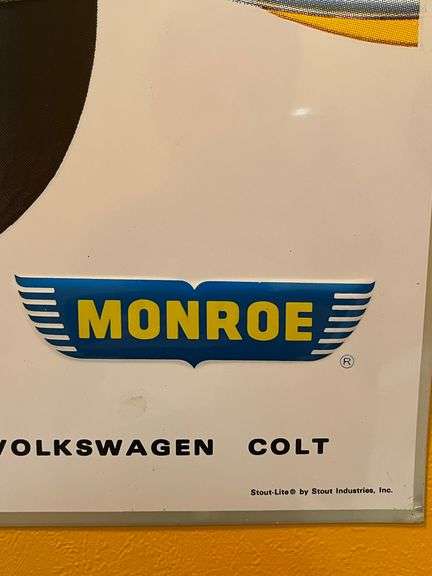 Metal Monroe Shocks Sign by Stout Industries - Albrecht Auction Service