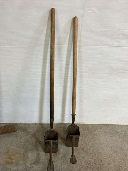 (2) Antique potato planters, old metal thatcher, antique trench shovel ...