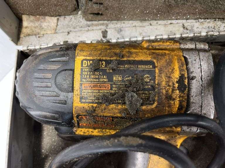 DeWALT impact DW293, new; DeWALT impact DW293, used, both in metal ...